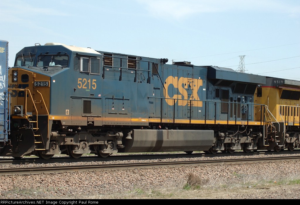 CSX 5215, ES44AC, trails eastbound on the UPRR